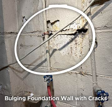 HCI_Bulging-Foundation-Wall-with-Cracks - Home & Commercial Inspections